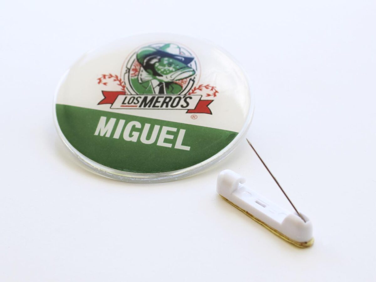 Pines Publicitarios - Botón Publicitario